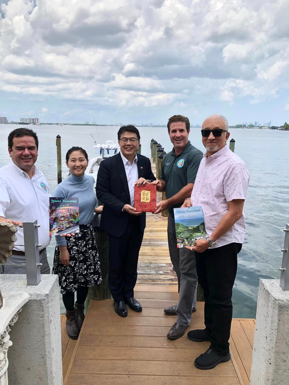 (from right to left) Mr. Eddie Lim, Mayor Brent Latham, Director ...